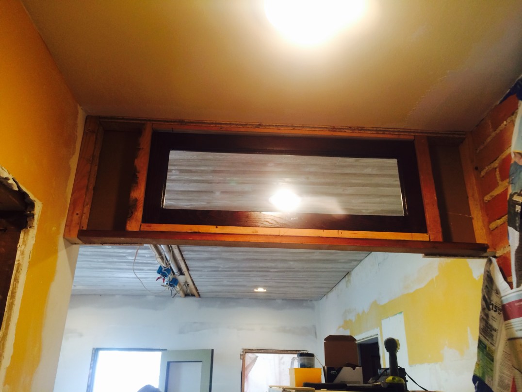 Making old, new! Transom window installation | ourvintagepleasure